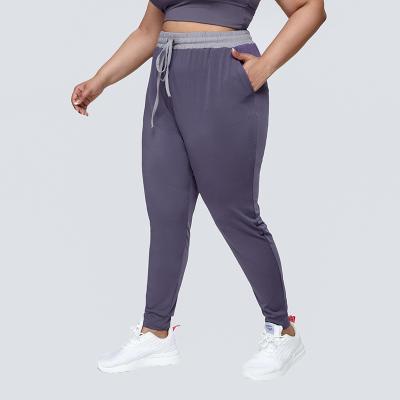 Cina Essiccazione rapida sciolta più i pantaloni di yoga di dimensione che eseguono i pantaloni casuali di sport del cordone in vendita