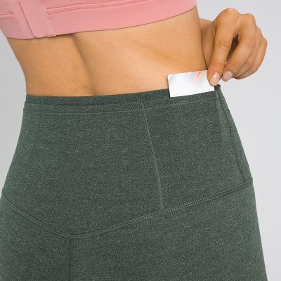 Cina pantaloni di nylon di yoga di forma fisica delle donne di 220gsm 80% che modellano multi svago Capris di sport della tasca in vendita