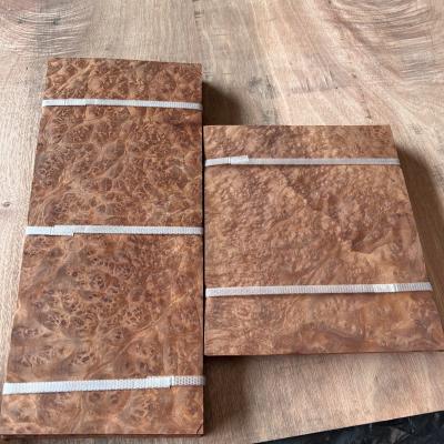 China 0.45mm Red Camphor Burl Veneer Sliced For Grade Craftsmanship Cutting Process Slicing for sale