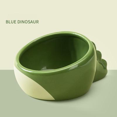 China Groene 13*7cm 10*5cm Ronde de Dinosaurusvorm van de Huisdieren Ceramische Kom het Anti Braken Ceramische Hondkommen Te koop
