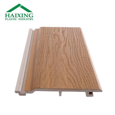 China Außen-Verriegelung Holz Textur PVC Kunststoff Wandplatte mit modernem Design-Stil zu verkaufen
