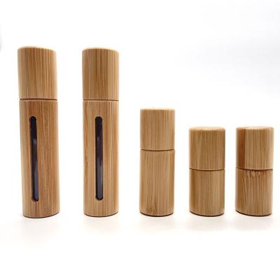 China Recyclable Bamboo Wood Skylight Covered Bamboo Bead Bottle for Perfume/Essential Oil for sale