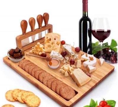 Cina Campione gratuito tabellone di formaggio di bambù e set di coltelli per il taglio di cioccolatini in vendita