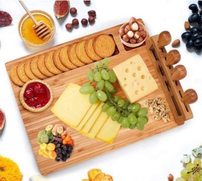 Cina Campione gratuito tabellone di formaggio di bambù e set di coltelli per il taglio di cioccolatini in vendita
