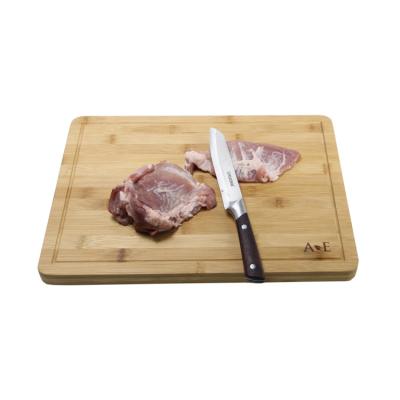 Cina Stoccati utensili da cucina ecologici Tavola da taglio in legno massello multiuso con maniglia in vendita