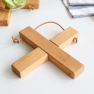 China Irregular Beech Walnut Wood Insulation Mat for Large Dining Table Printing Burned for sale