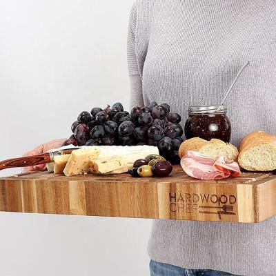 China Custom Logo Acceptable Multi-function Wood Heat Resistant Cutting Board for Kitchen for sale