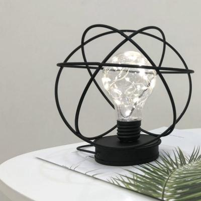 Cina Costo campione gratuito Logo personalizzato filo metallico lanterna a LED lampada da tavolo con tubo di vetro e lampadina LED in vendita