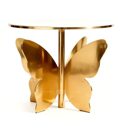 China 2026 New Design Round Dining Table Modern Luxury butterfly Shape Base with Glass TOP for Wedding for sale