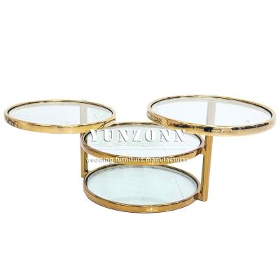 China Uniquely Designed Golden Polished Stainless Steel  Top Round Shape Rotating Coffee Table for sale