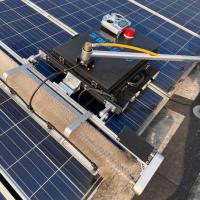 China Remote Controlled Solar Panel Cleaning Robot 1500mm Brush Width for PV Modules for sale