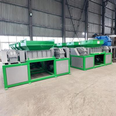 China Máquina de trituración de neumáticos de chatarra de caucho de doble eje con función de trituración en venta