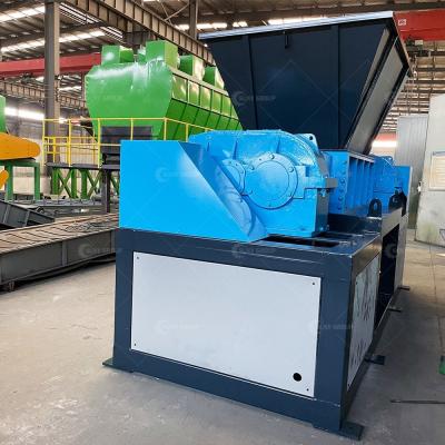 Cina Sedile da tavolo in legno di scarto Double Shaft Shredder con lame personalizzabili e controllo PLC in vendita
