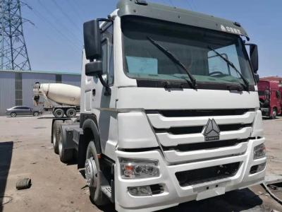 Chine 100 unités 2016 ont fait dans l'appareil de chauffage et le climatiseur de camion à benne basculante de verseur de Sinotruck Howo de pneus de la tête 6*4 10 de tracteur de porcelaine à vendre