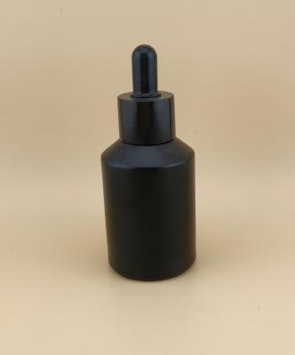 China Delicate Design Black Glass Dropper Bottle for Face Essence for sale