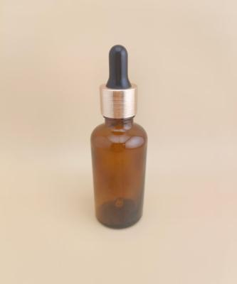 China Delicate Design Medium Clear Brown Smooth Round Dropper Bottle for Skincare for sale