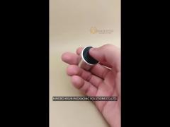 silvery aluminium-plastic round smooth cap with black button for skincare bottles