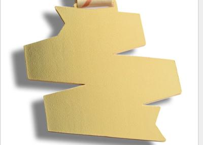 China Logo Custom Ribbon Shape Custom Award Medals Soft Enamel Die Casting Plated for sale