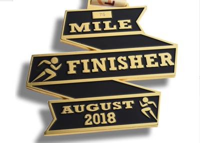 China Logo Custom Ribbon Shape Custom Award Medals Soft Enamel Die Casting Plated for sale