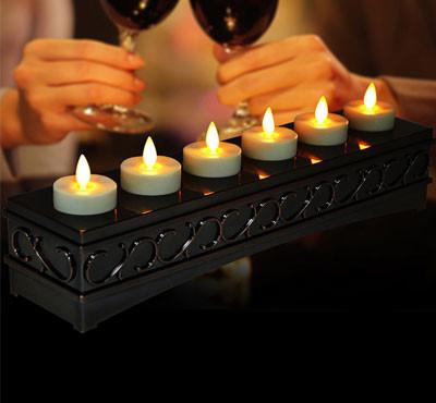 China Remote Control Led Flameless Wireless Rechargeable Tealight Led Candle With Moving Flame for sale