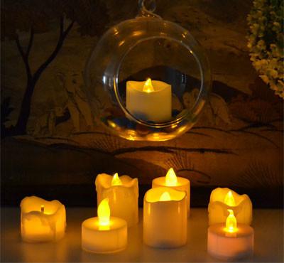China Flameless Votive Candles Battery Operated Led Tea Lights Flickering Amber Tealight Candles for sale