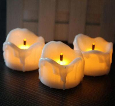 China Flameless Yellow Flicker Tear Wax Drop Candle Mini Battery Operated Tea Lights New Arrive Realistic Led Tea Light Candle for sale