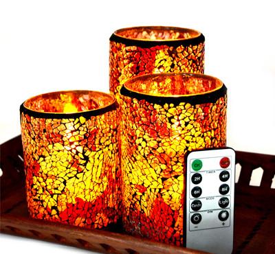 China Moving Wick Glass Mosaic Flameless Wax LED Candles for sale