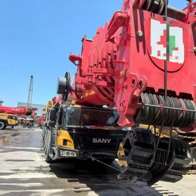 Китай Б/у кран Sany SAC6000 2018 года выпуска имеет основную стрелу 90 м, гусек 42 м и противовес 165 т. Он в отличном рабочем состоянии. продается