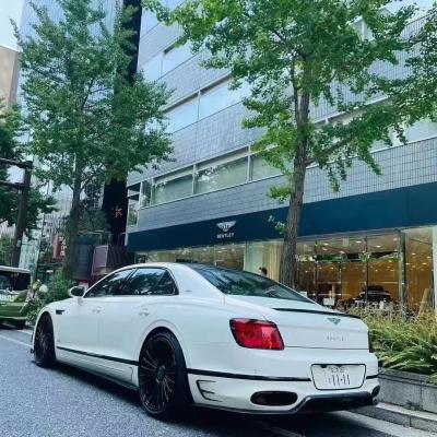 Cina Bentley Flying Spur Corpo in fibra di carbonio Kit Flying Spur aggiornamenti stile MANSORY diffusore della bocca anteriore Spoiler cappuccio corpo kit in vendita