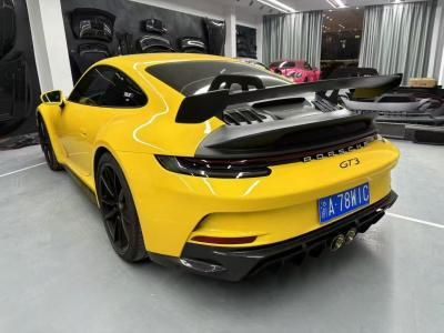 Cina Porsche 992 Carrozzeria in fibra di carbonio Kit 992 stile GT3 frontale e posteriore paraurti gonna laterale spoiler cappuccio in vendita