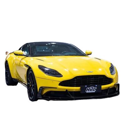Cina Per Aston Martin DB11 Carbon Fiber Body Kit DB11 Upgraded PK Style Carbon Fiber Front Lip Diffuser Spoiler Hood in vendita