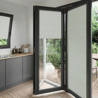 China Thermal Break Aluminum Alloy Bi-Fold Doors with Glass Inserts and Easy Maintenance for sale
