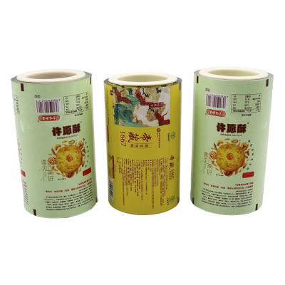 China Sachet Wrapper Film Roll Plastic Foil Material Pet/Al/Pe Custom Condom Packaging Sachet Liquid Honey Bee Packaging Film Rolls for sale