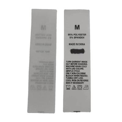 China Washable High Quality Permanent Adhesive Fragile Warning Packing Shipping Label Rolls Satin Care Label Size Labell Tag for sale