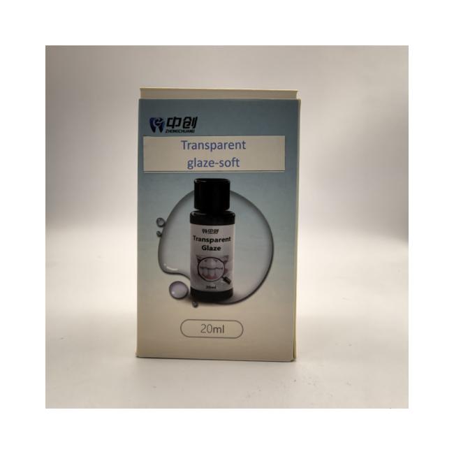 Close-up of glaze application on dental resin surface