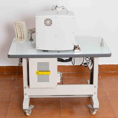 China Automatic Industrial Button Sewing Machine With 100 Pattern Storage Touchscreen for sale