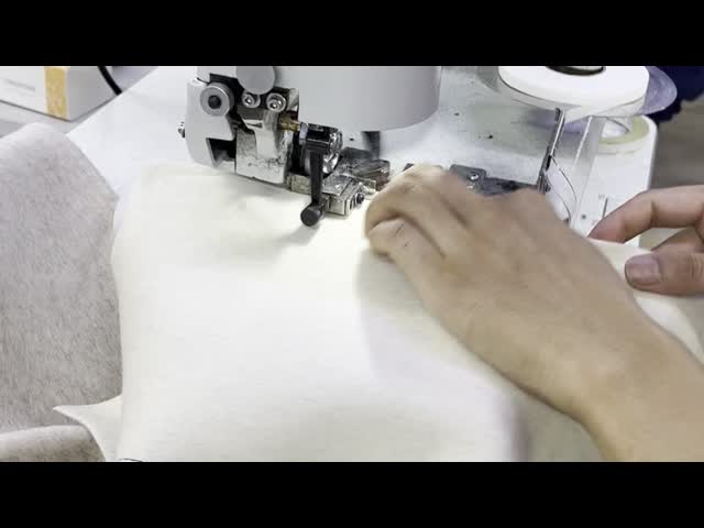 Double-faced fabric blind-stitch sewing machine with automatic feeding interlining strips
