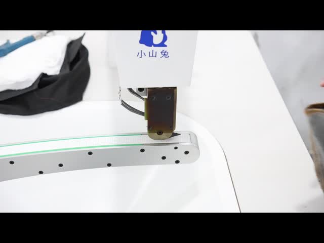 自動縫い目開き・アイロン機工場（衣料品製造用）