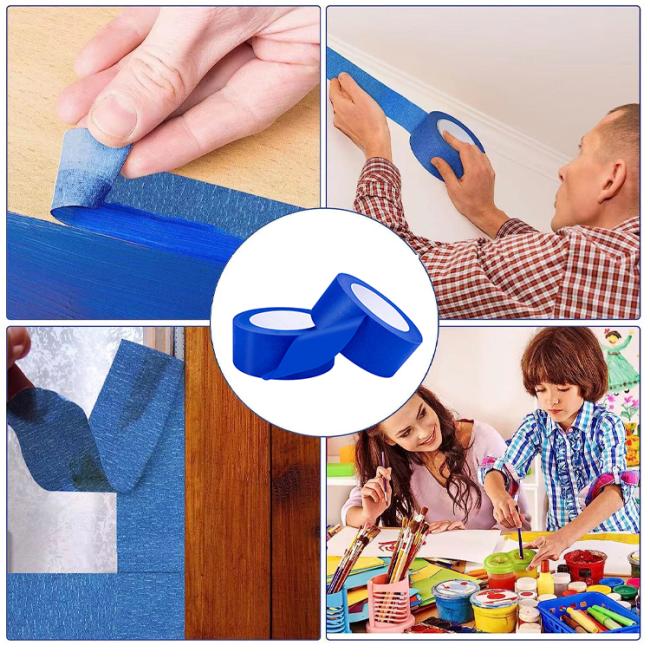 Professional painter using blue masking tape for precise edges