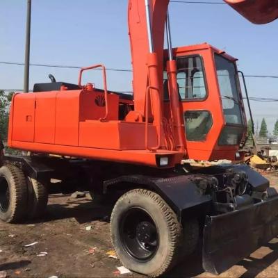 Китай 13 тонн использованный колесный экскаватор Doosan DH130W с оригинальным гидравлическим цилиндром в Дубае продается