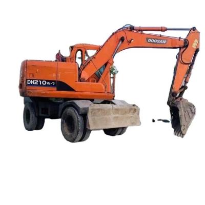 Cina Escavatore Doosan DX60W da 5,5 tonnellate con scarse ore di lavoro e condizioni eccellenti in vendita