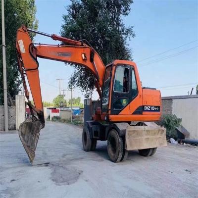 Cina Escavatore Doosan DX60W da 5,5 tonnellate con scarse ore di lavoro e condizioni eccellenti in vendita
