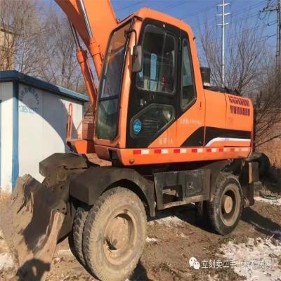 Cina Escavatore Doosan DX60W da 5,5 tonnellate con scarse ore di lavoro e condizioni eccellenti in vendita