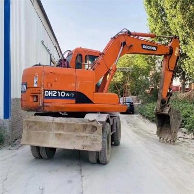 Cina Escavatore Doosan DX60W da 5,5 tonnellate con scarse ore di lavoro e condizioni eccellenti in vendita