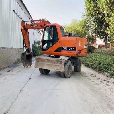 Cina Escavatore Doosan DX60W da 5,5 tonnellate con scarse ore di lavoro e condizioni eccellenti in vendita