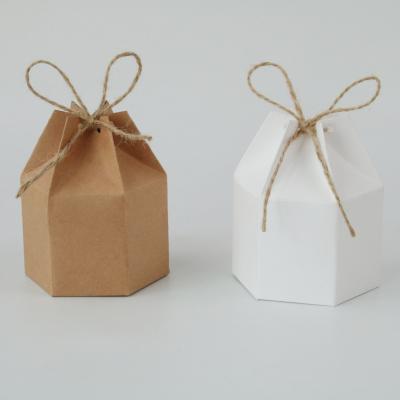 China 250g Kraft Paper Hexagon Packaging Box With Yurt Bow for sale