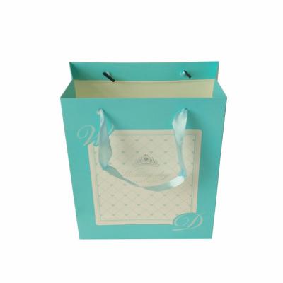 China Iron Silver Crown Printed Paper Bags Eco Friendly Paper Gift Bags 35g/Pcs for sale