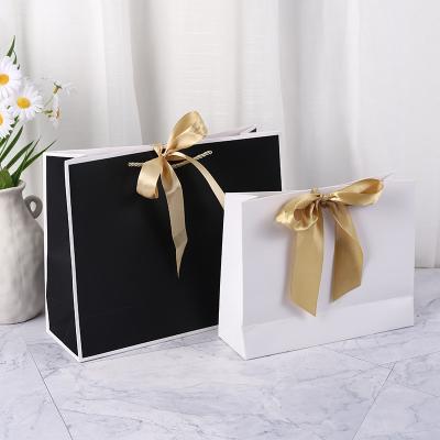 China Square Bow Knot ECO Friendly Paper Bag For Gift Packaging 31g/PCS for sale