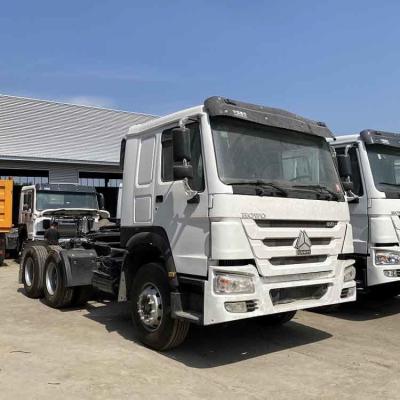 China Sinotruk Howo Truck Tractor 6x4 Used Head Tractor Truck 6800 kg GVW Automatic Window for sale