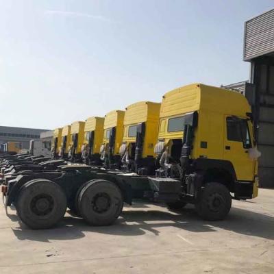 China Sinotruk Howo 6x4 Tractor Truck with Manual Transmission and HW76 Comfortable Cabin for sale